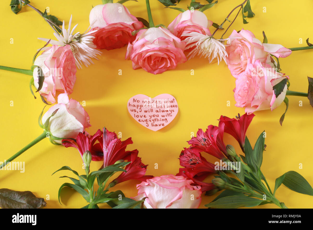 Flower arrangement with cute writing on a heart Stock Photo - Alamy
