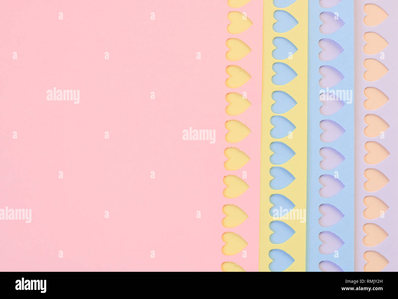 Colorful background with cutout hearts Stock Photo - Alamy