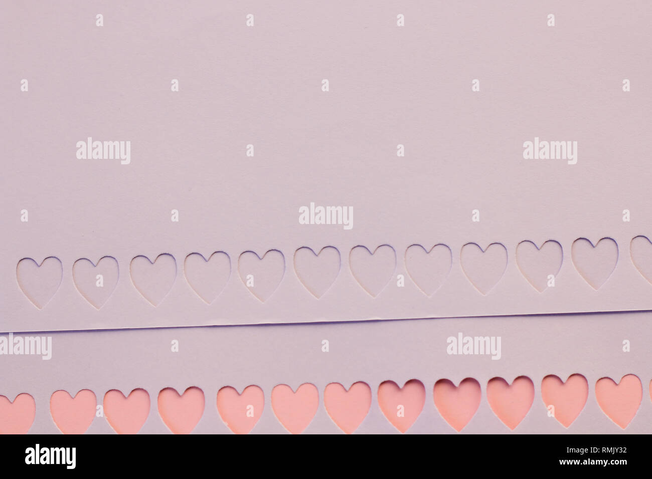Colorful background with cutout hearts Stock Photo - Alamy
