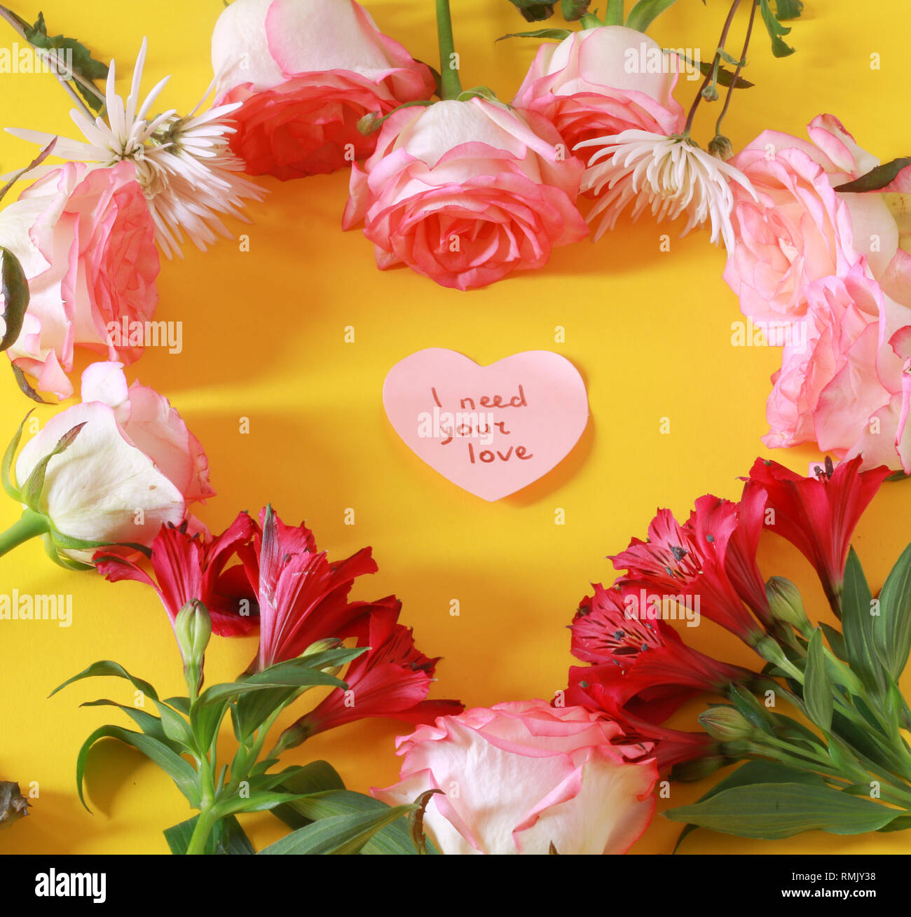 Flower arrangement with cute writing on a heart Stock Photo - Alamy