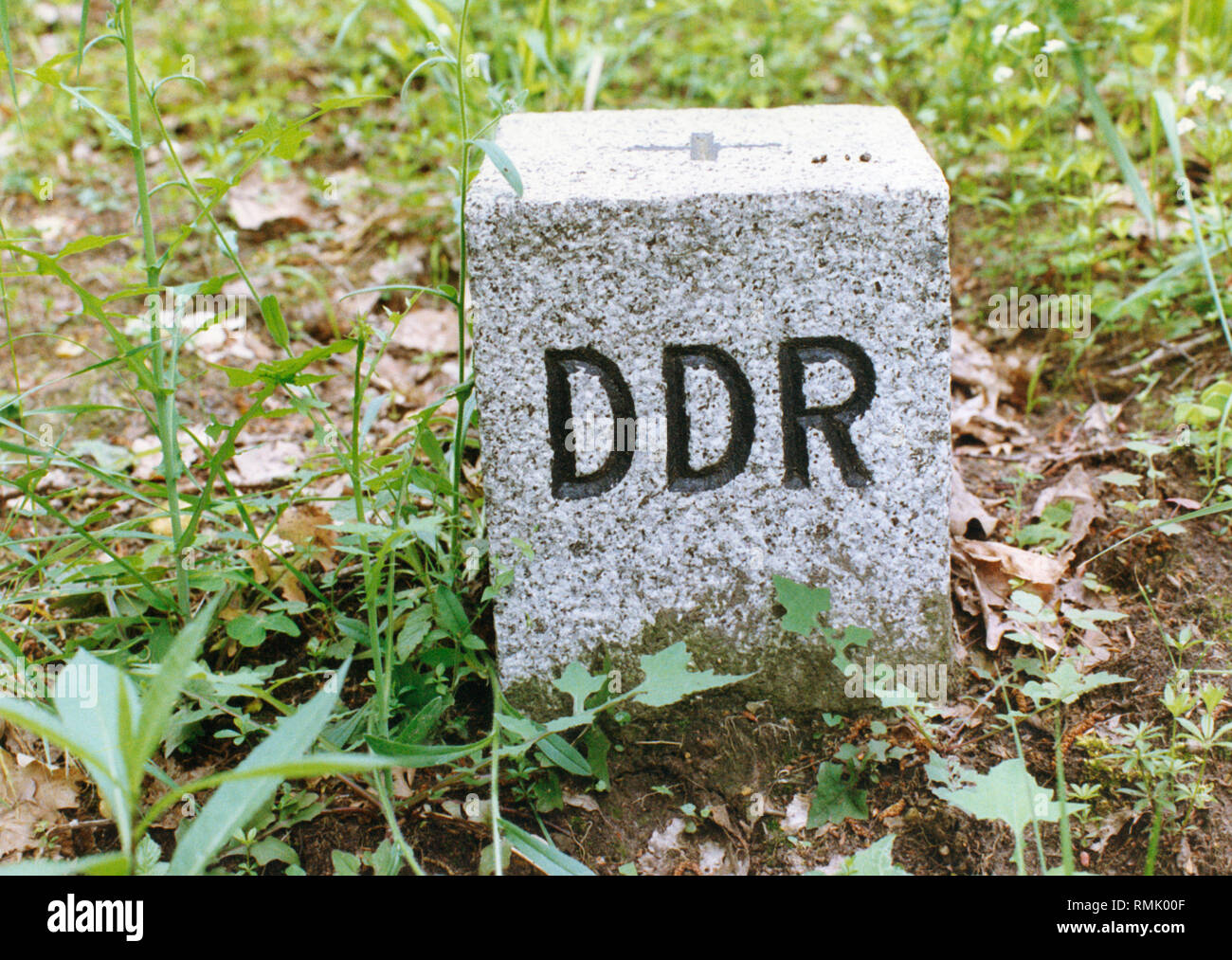 In the picture a GDR border stone in the forest at the inner German ...