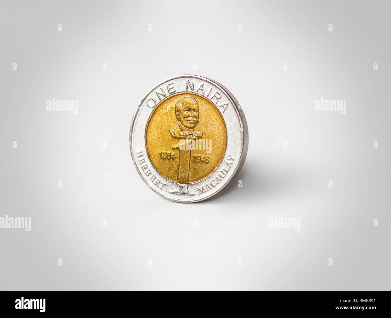 Naira and Pound Coins Stock Photo - Alamy
