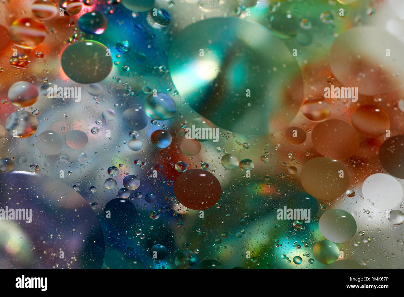 floating in the water abstract colorful oil drops Stock Photo - Alamy