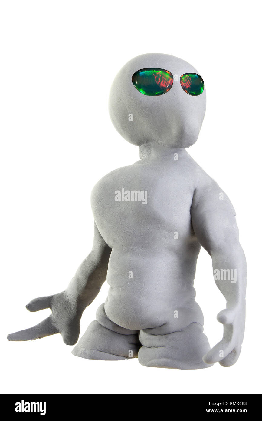 gray alien made of clay on a white background Stock Photo - Alamy