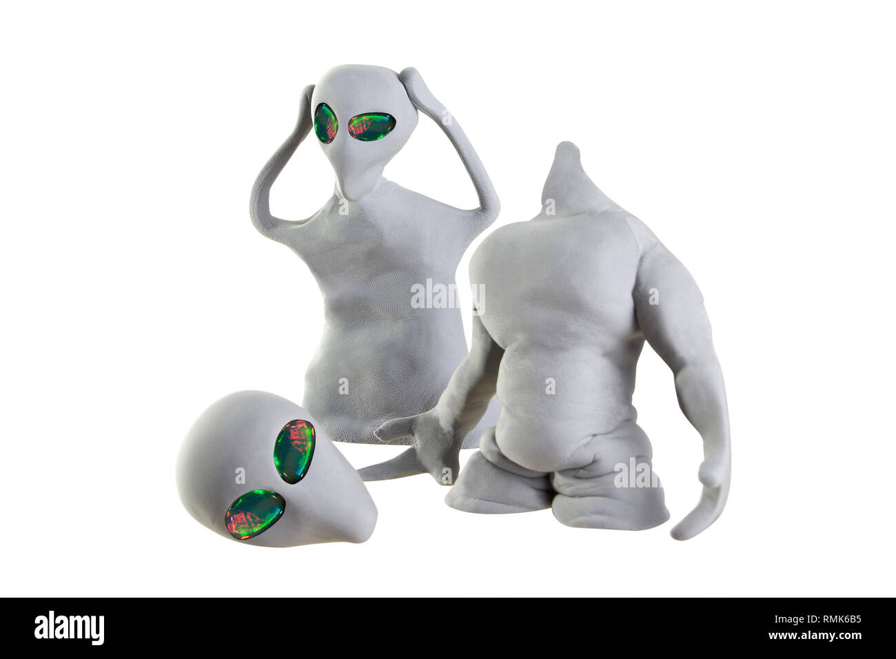 gray alien made of clay on a white background Stock Photo - Alamy