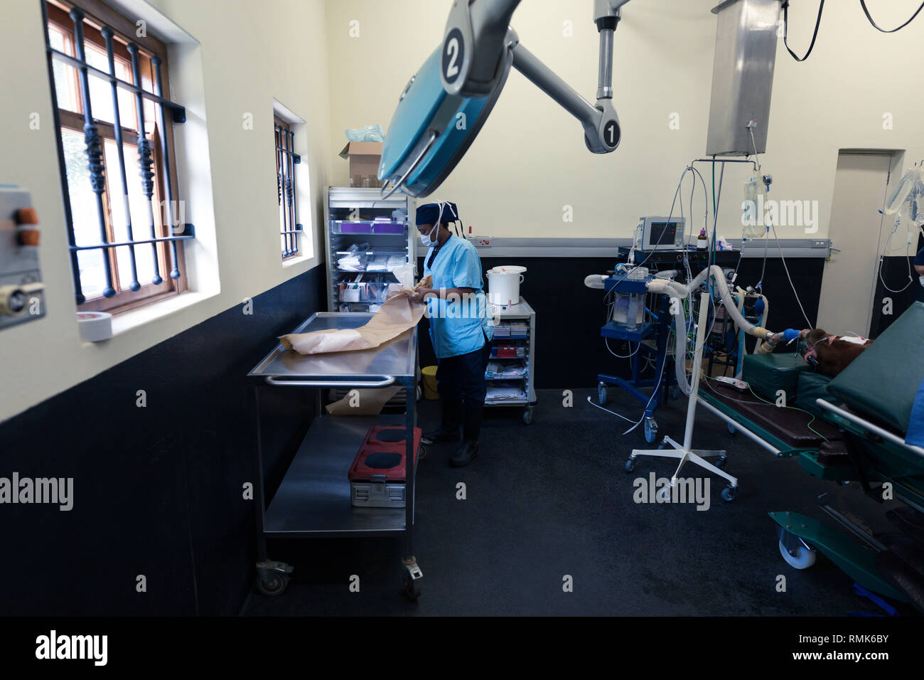 Female nurse working in operation theater Stock Photo - Alamy