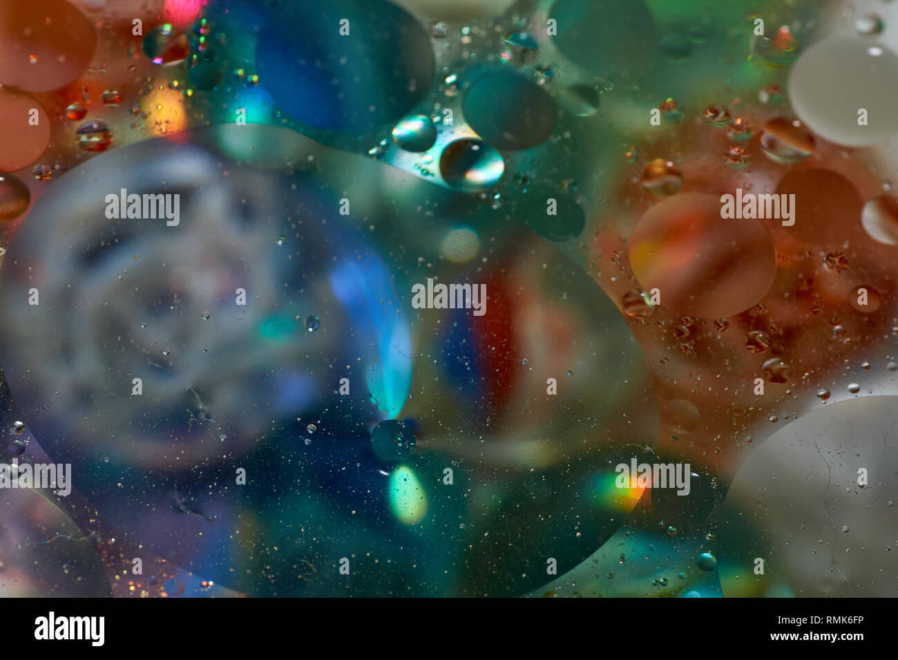 floating in the water abstract colorful oil drops Stock Photo - Alamy