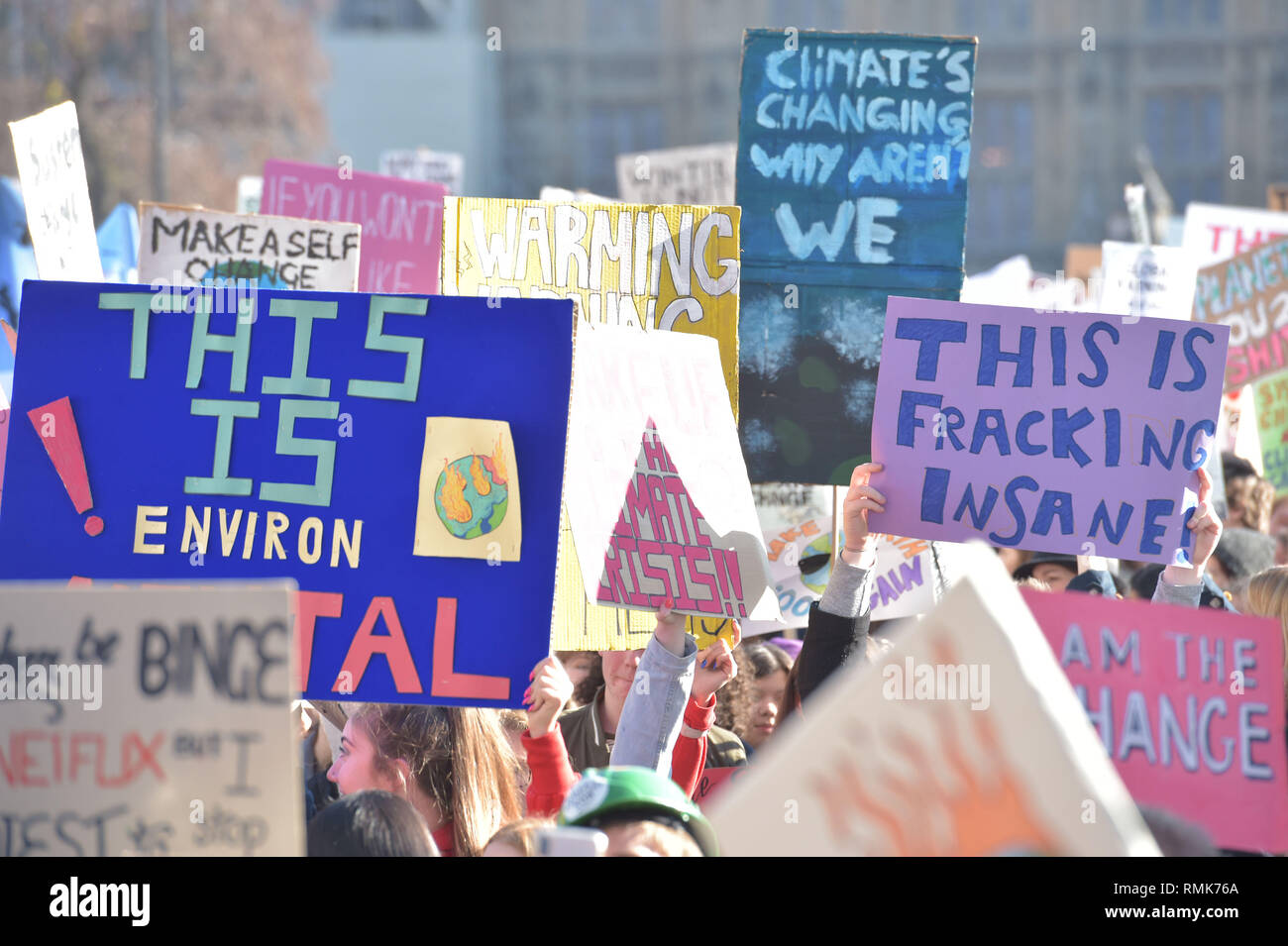Placards at a climate change protest on Parliament Square in ...