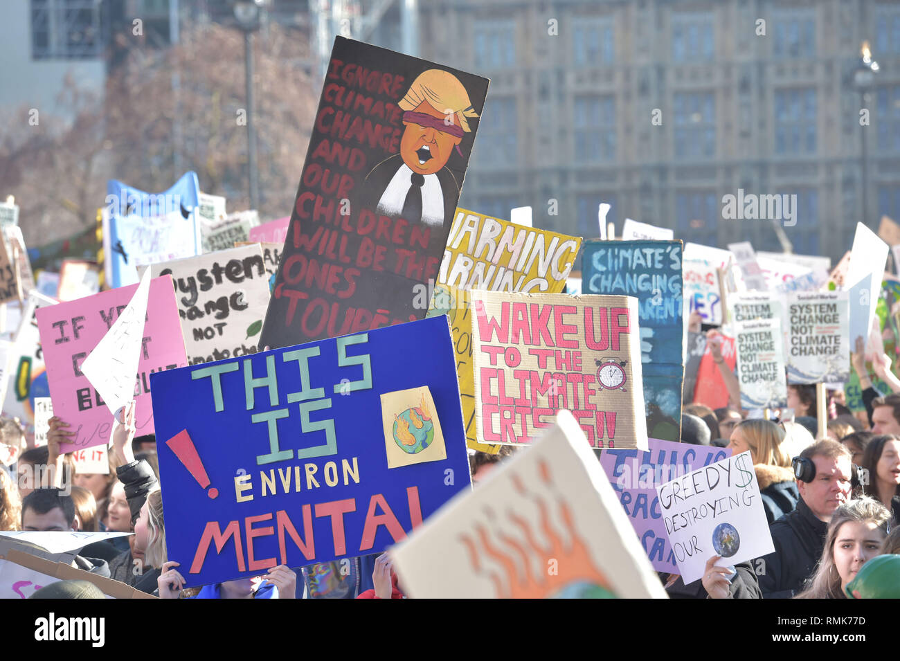 Placards at a climate change protest on Parliament Square in ...