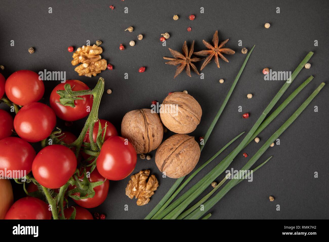 Tomatoes with Greek nuts Stock Photo - Alamy
