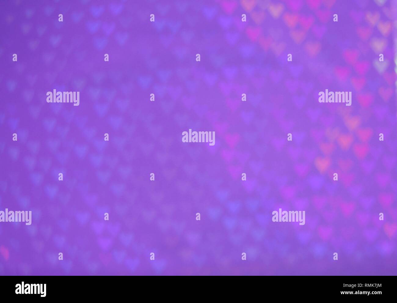 Purple background with out of focus hearts Stock Photo - Alamy