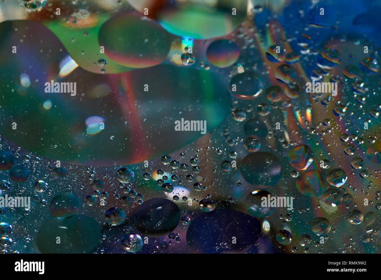 floating in the water abstract colorful oil drops Stock Photo - Alamy