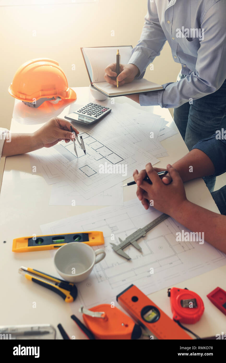 Engineer and Architect concept, Engineer Architects office team working ...