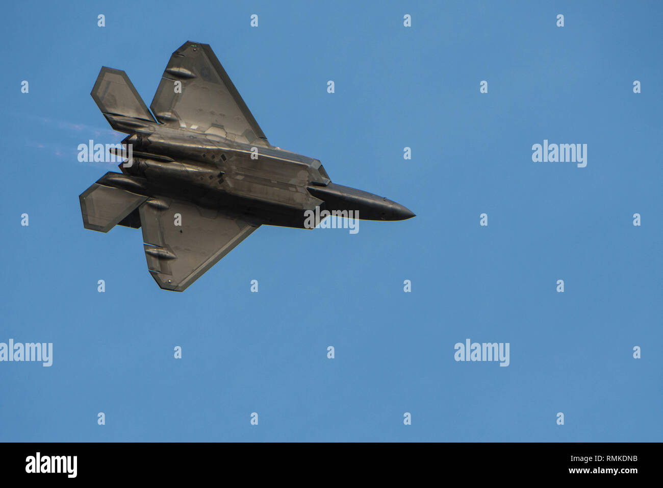 F-22 Demo Team pilot, Major "Loco" Lopez performs during a demo team ...