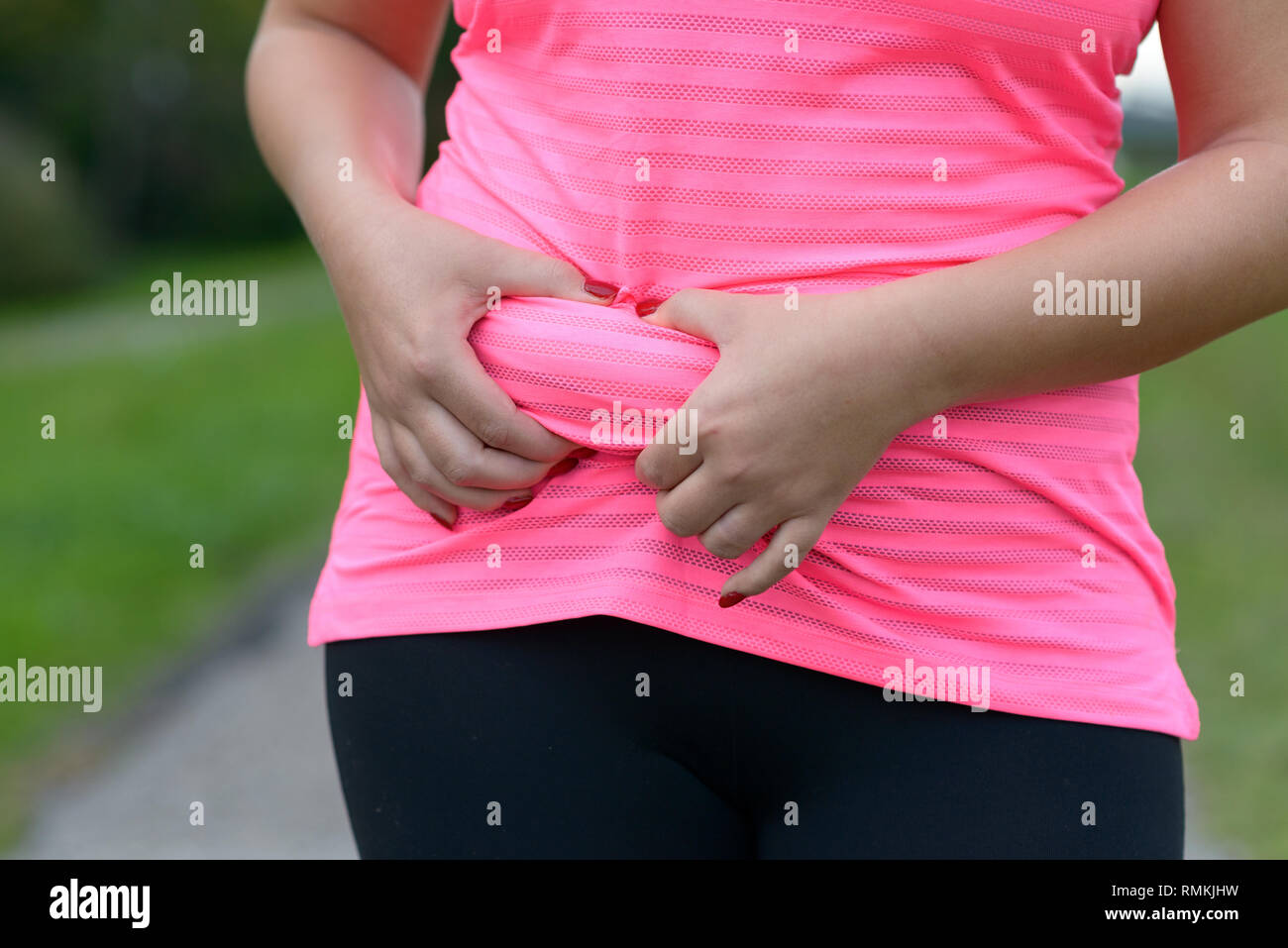 Fat Stomach Woman Holding High Resolution Stock Photography and Images ...
