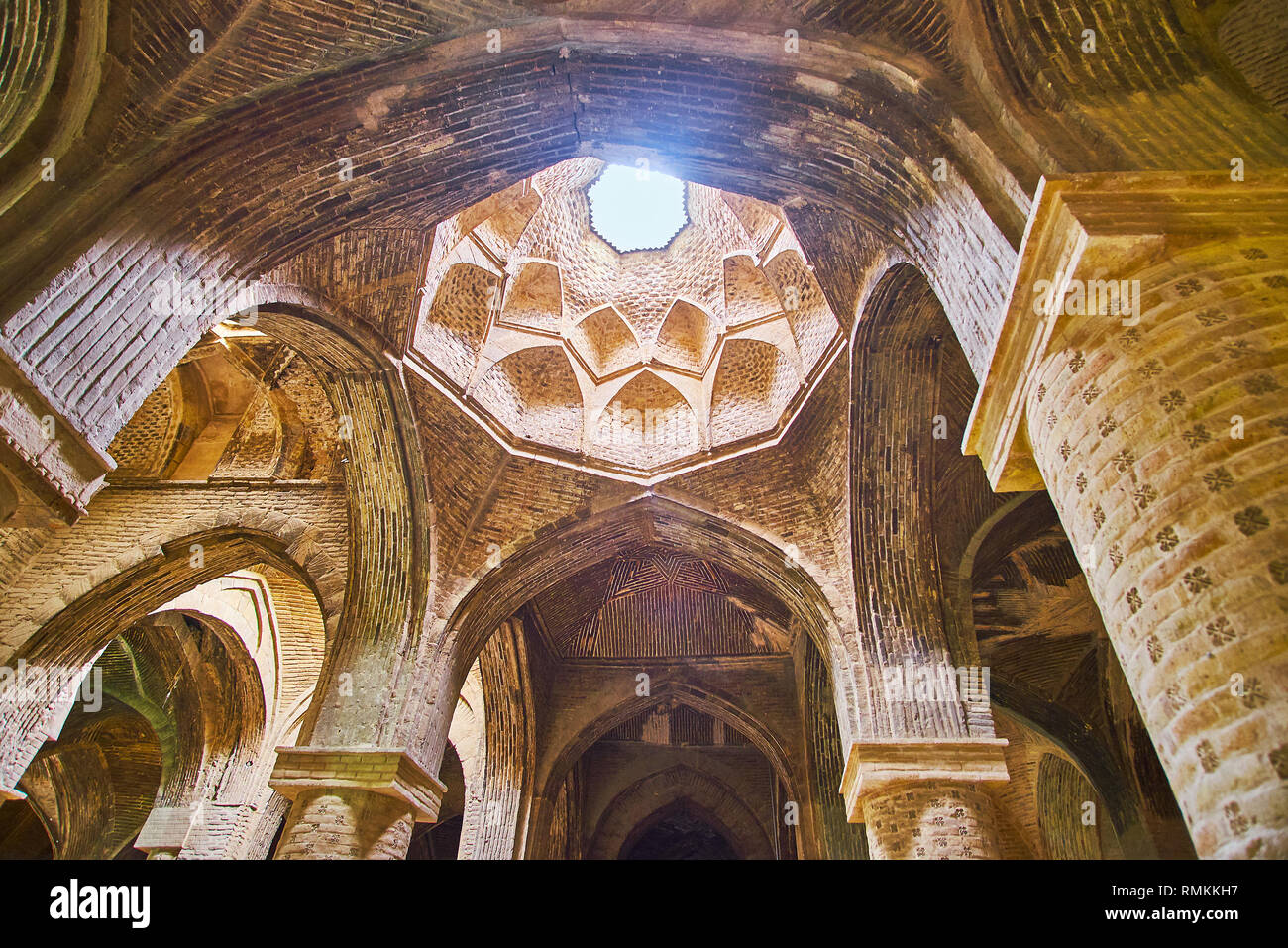 ISFAHAN, IRAN - OCTOBER 21, 2017: The light hole in carved dome of ...
