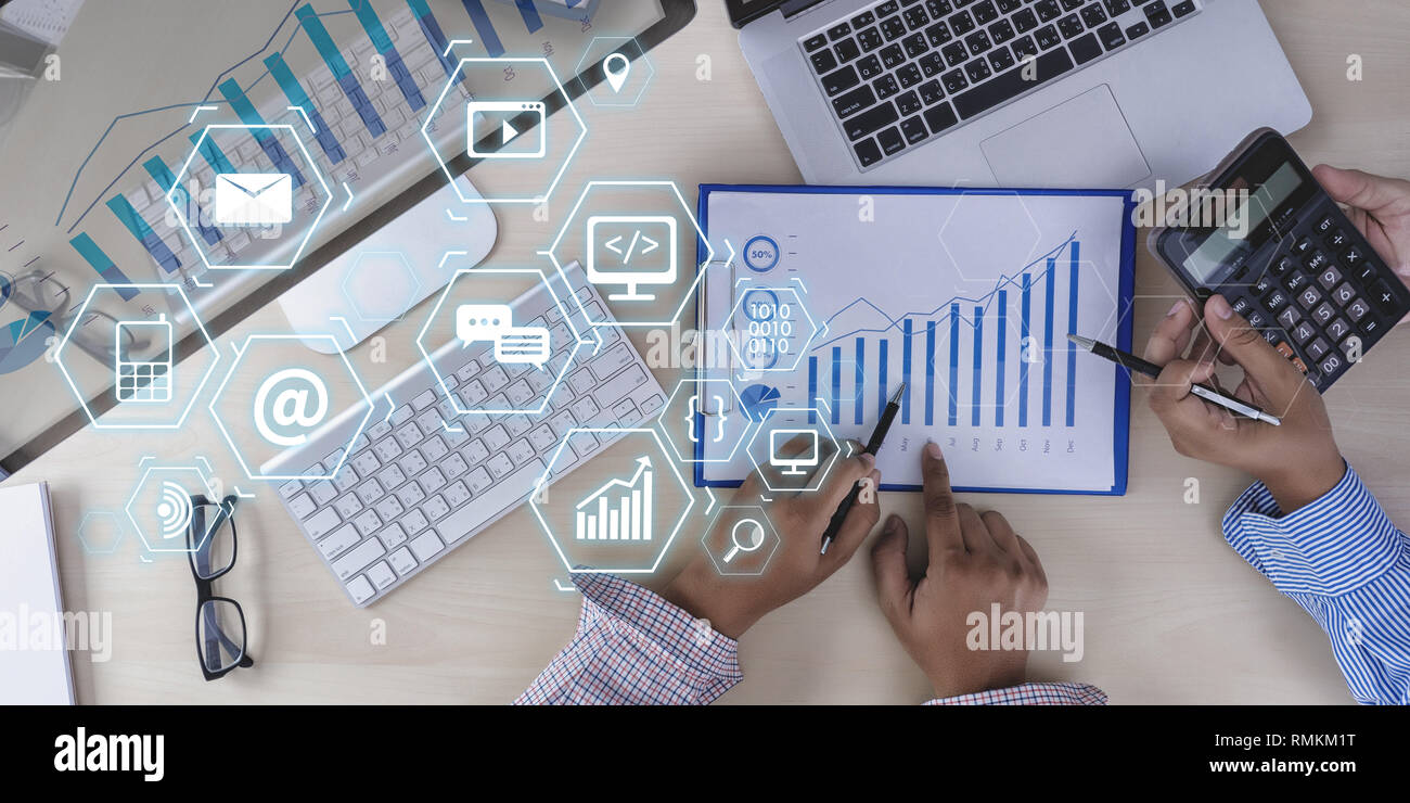 Man using tablet computer virtual interface graphic icons network ...