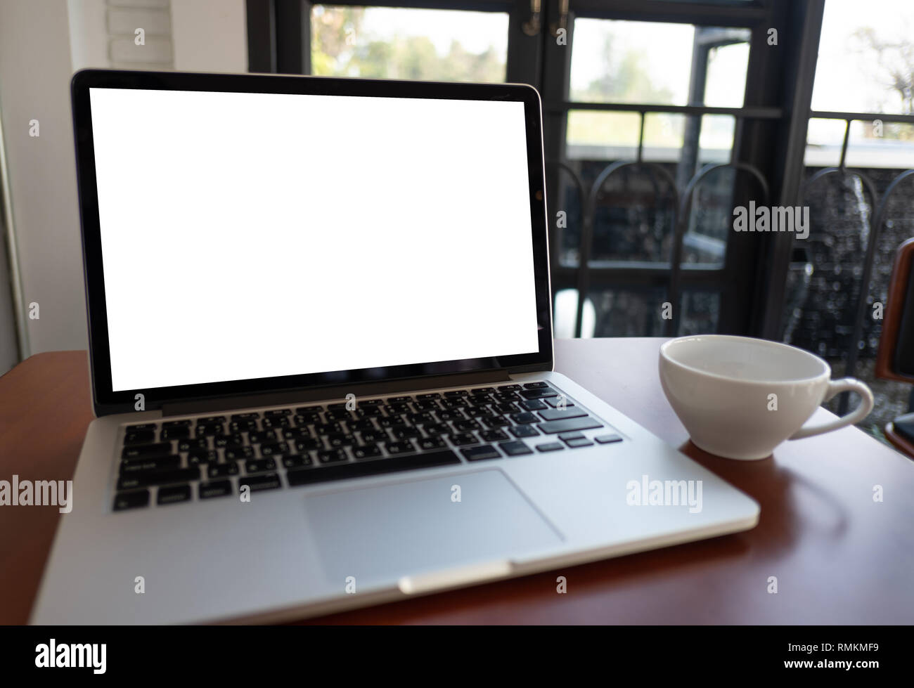 mock up Using laptop with blank screen computer modern Stock Photo - Alamy