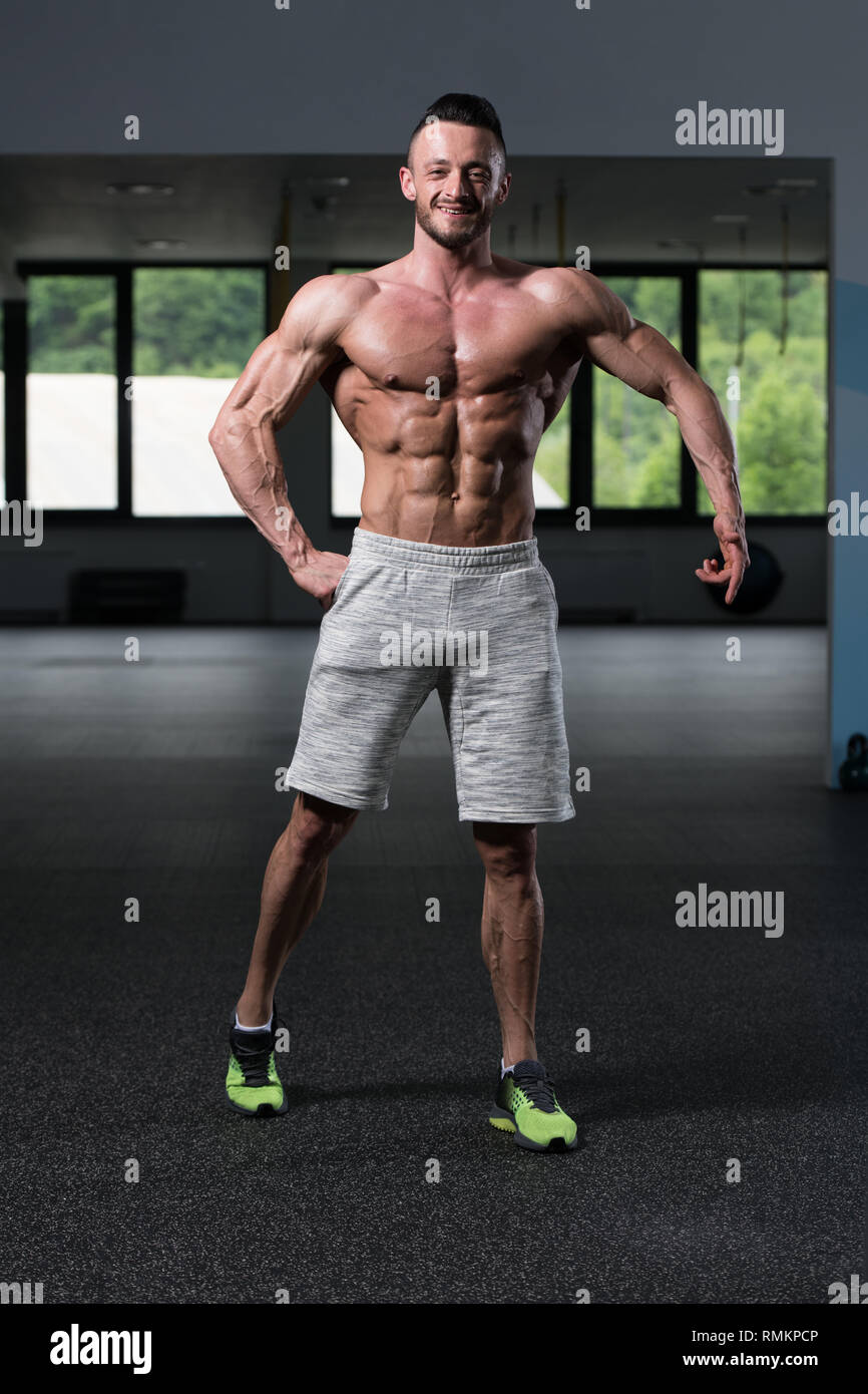 Portrait Of A Young Physically Fit Man Showing His Well Trained Body ...