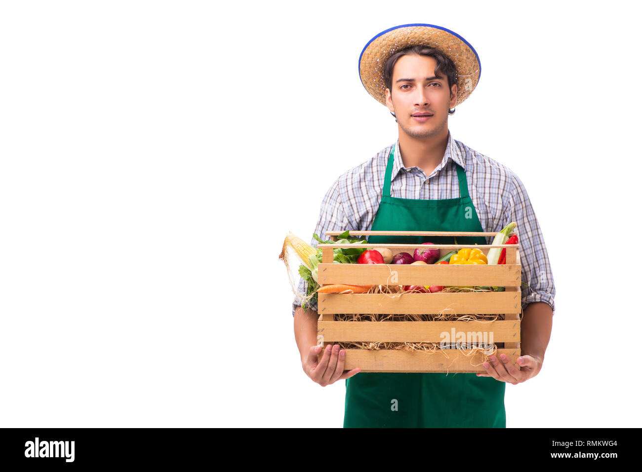 Young farmer with fresh produce isolated on white background Stock ...