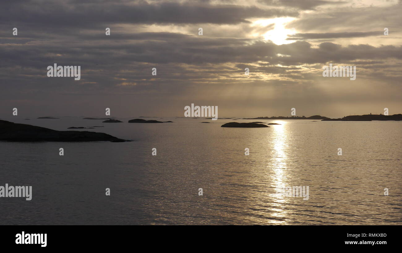 Norwegian Sunset over the water Stock Photo - Alamy