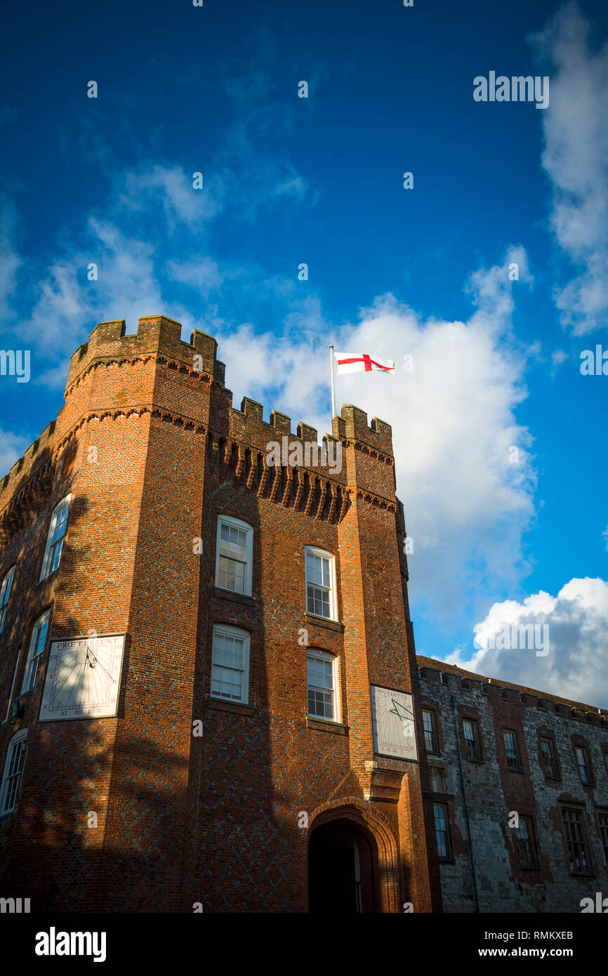England flag flying above castle fortifications with blue sky Stock ...