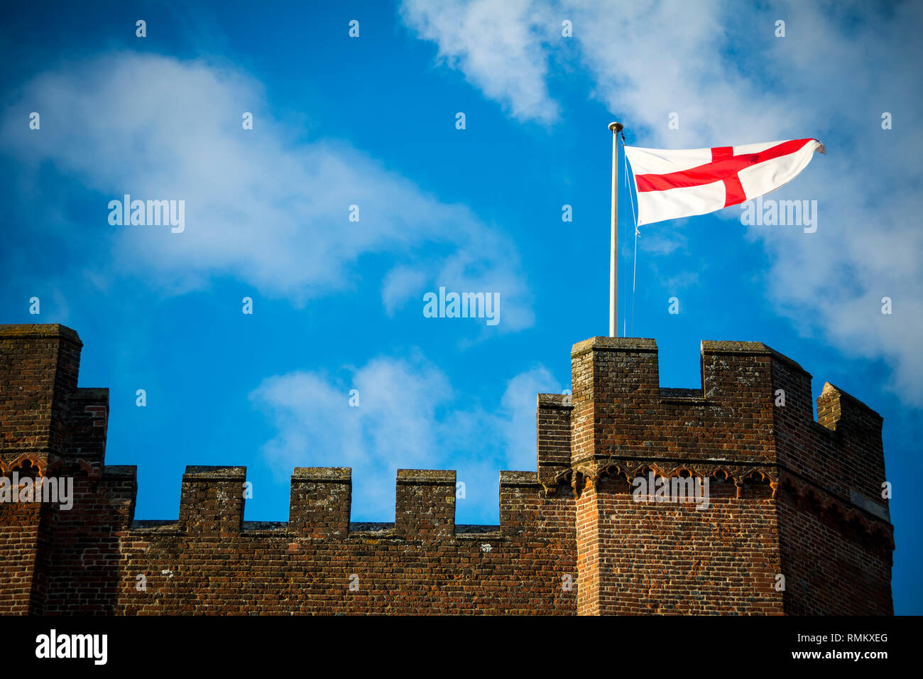 England flag flying over castle walls on sunny day Stock Photo - Alamy