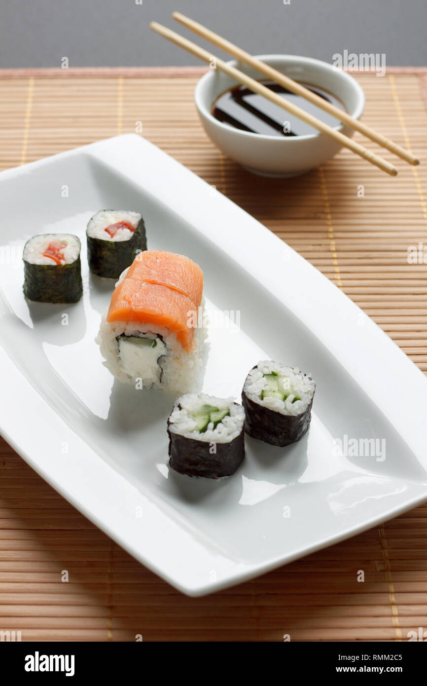 Traditional japanese seafood, roll and chopstick. Soy souce. Healthy ...