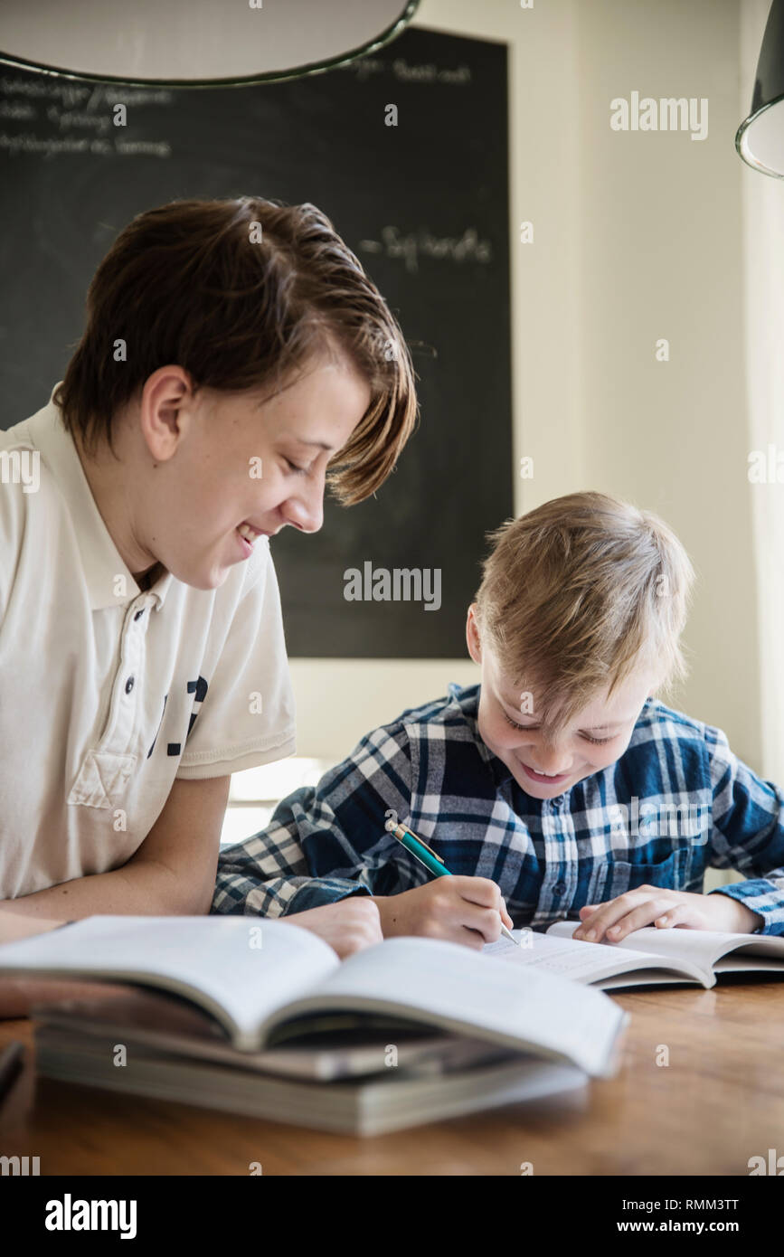 Brothers Help High Resolution Stock Photography and Images - Alamy