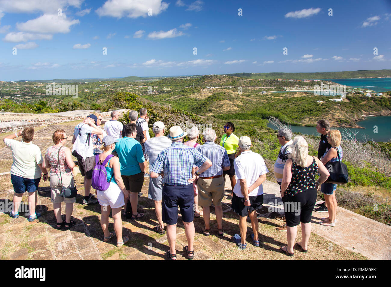 Tour group at Blockhouse ruins, The Nelsonâ€™s Dockyard National Park ...