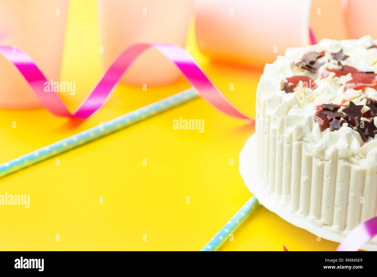 Sponge layer birthday cake with whipped cream frosting chocolate star ...