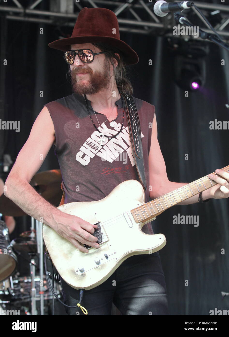 Musician Jonathan Wilson is shown performing on stage during a "live ...