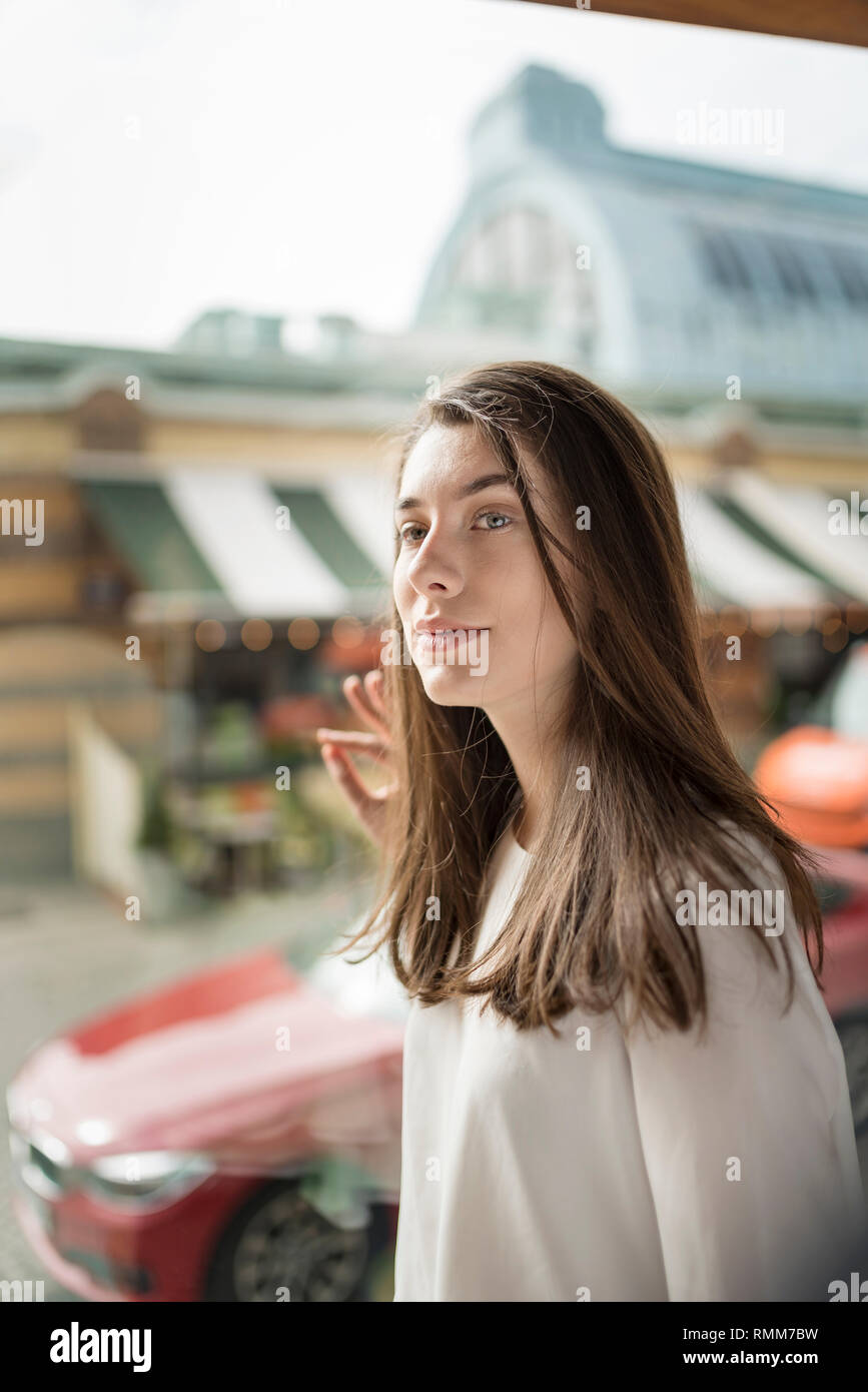 Young woman street side view hi-res stock photography and images - Alamy