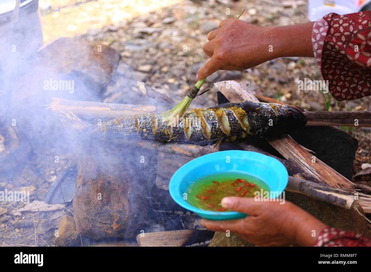 The process of cooking and making some foods made from fish. Raw ...