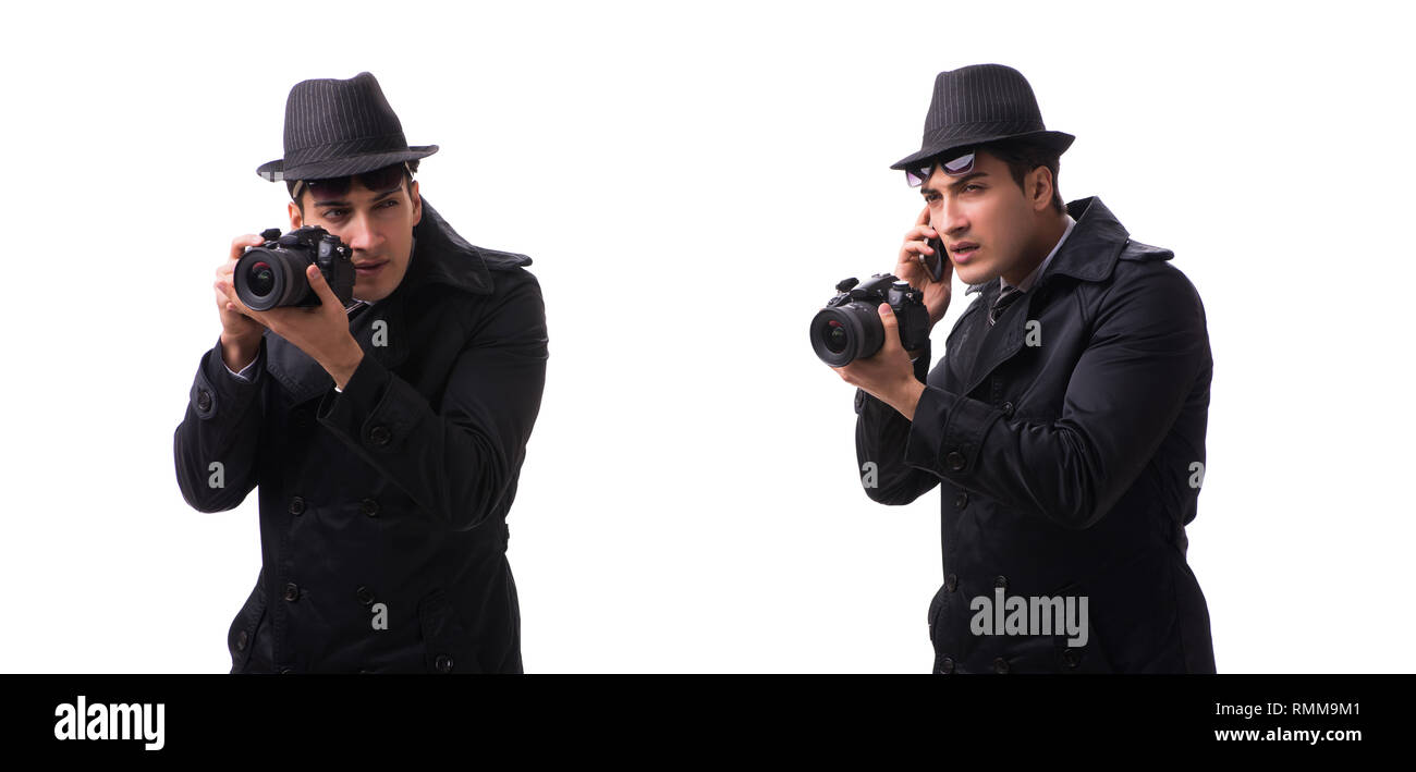 Spy with camera taking pictures isolated on white Stock Photo - Alamy
