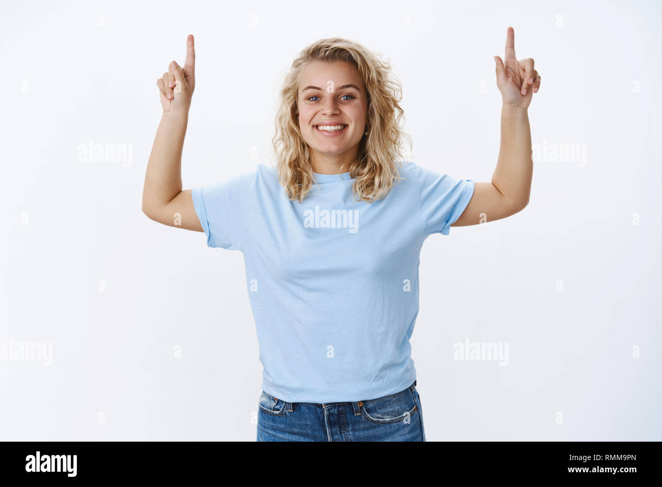 Time turn heads up. Portrait of optimistic and charismatic young happy ...