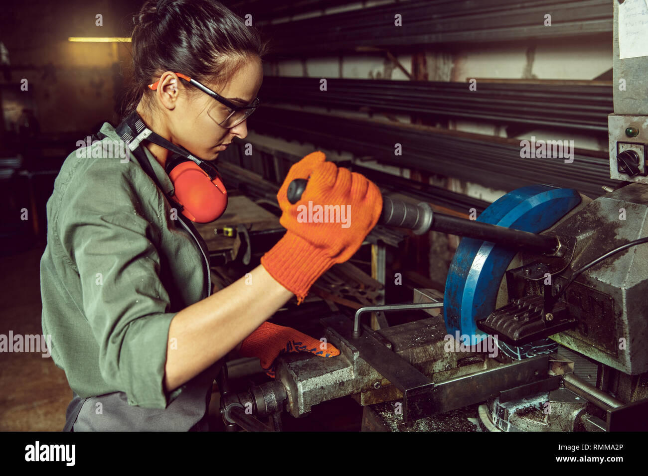 Woman joiner grinding wood hi-res stock photography and images - Alamy