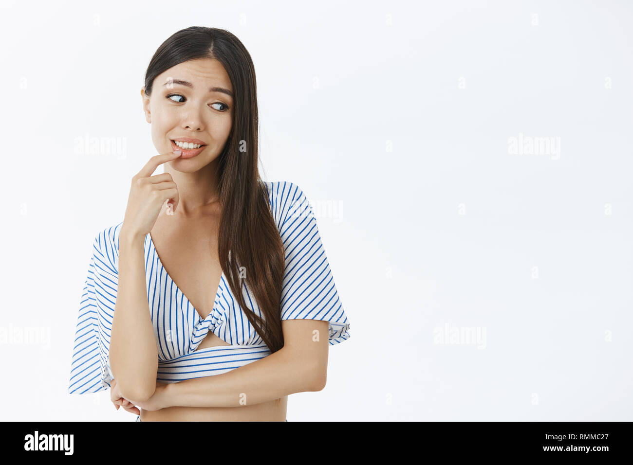 Waist Up Shot Of Silly Feminine And Cute Asian Woman With Dark Hair In