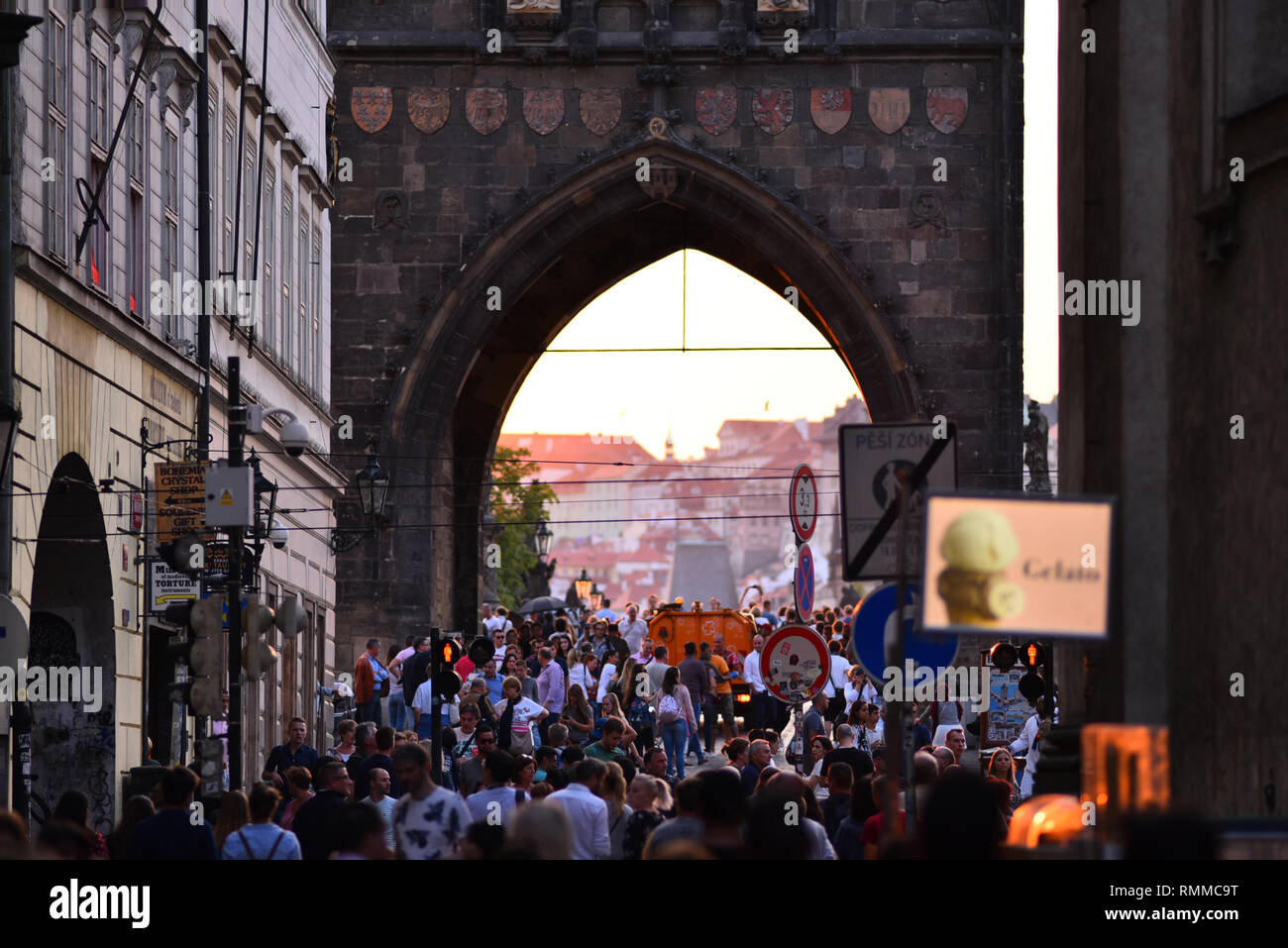 Crowd of tourists by the Bridge Tower and the Charles Bridge entrance ...