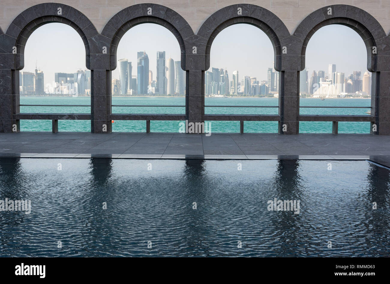 Doha, Qatar - November 9, 2016. Doha skyline viewed through the arches ...