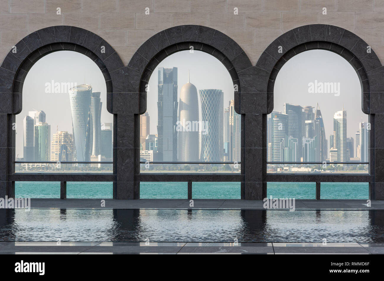 Doha, Qatar - November 9, 2016. Doha skyline viewed through the arches ...