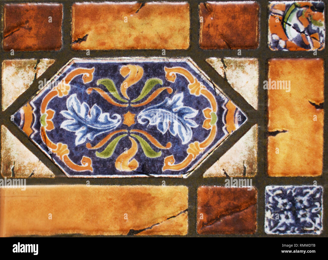Detail of the traditional tiles from facade of old house. Decorative ...