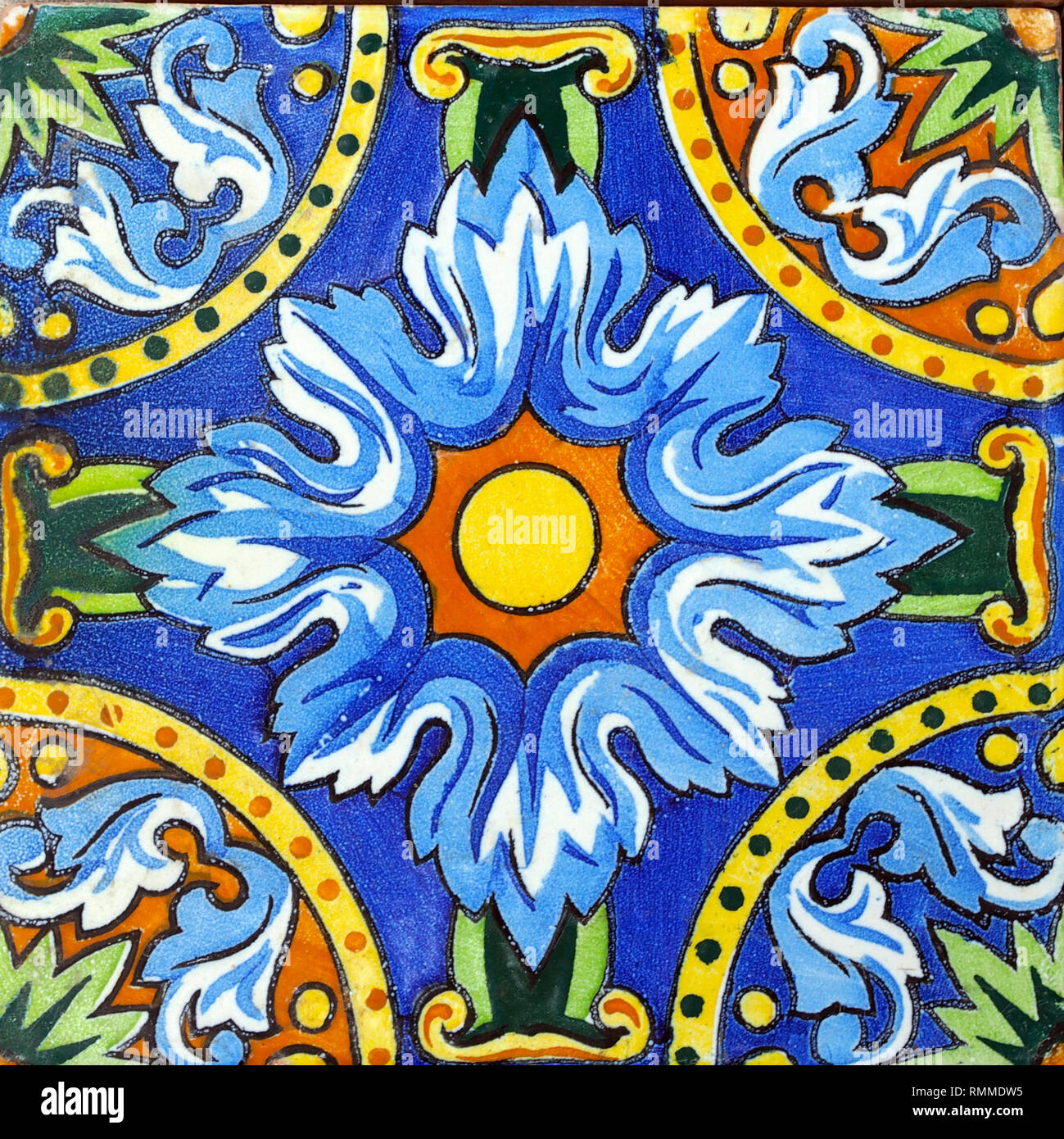 Detail of the traditional tiles from facade of old house. Decorative ...