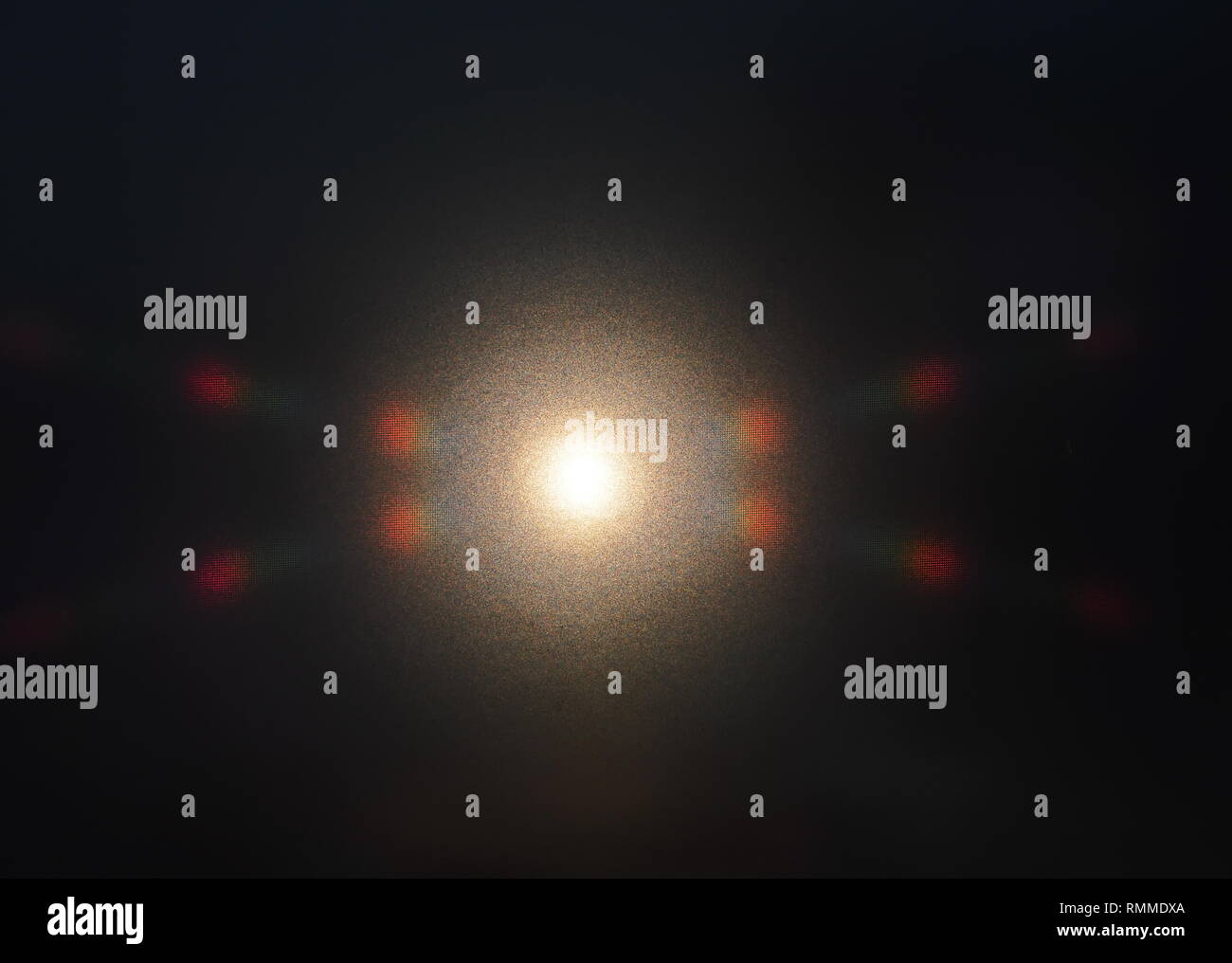 blur candle light reflection on television screen in the dark Stock ...