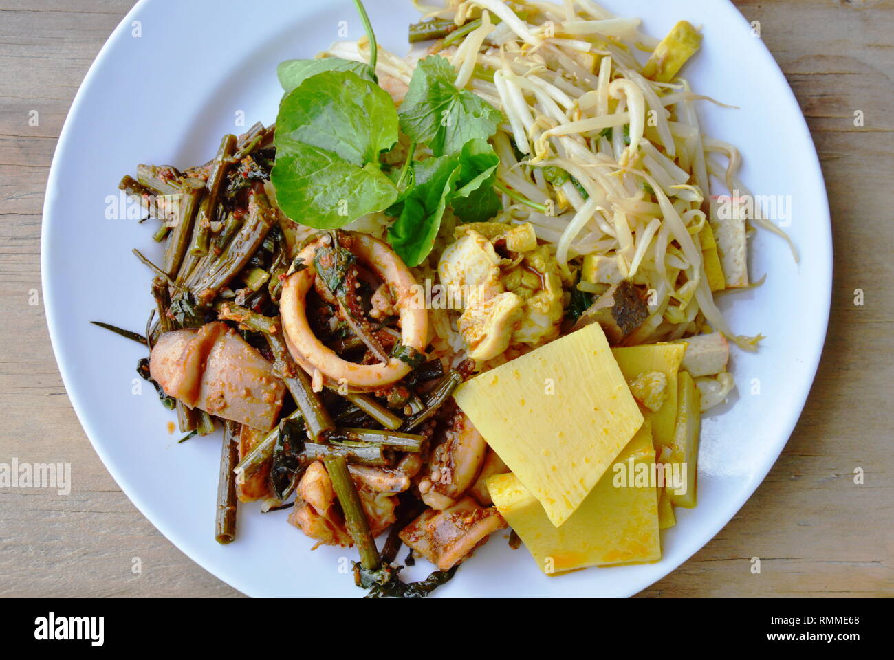 Thai meal rice topping variety food on single plate Stock Photo - Alamy