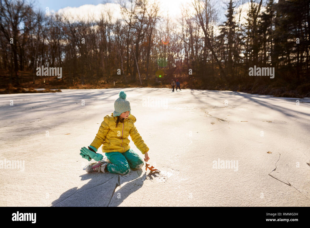 Three people ice skating hi-res stock photography and images - Alamy