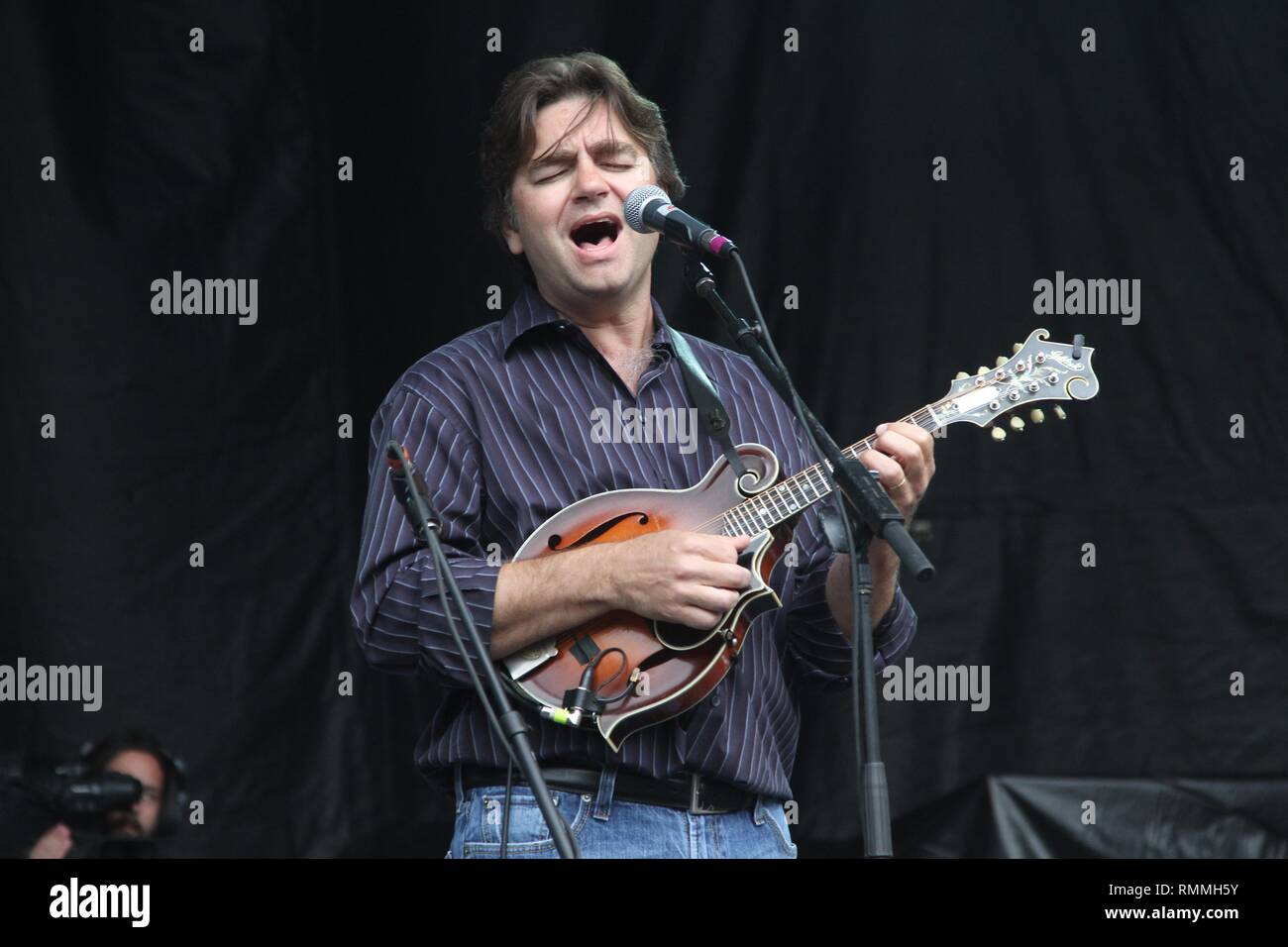 Ronnie McCoury is shown playing with the Travelin' McCoury's during a ...