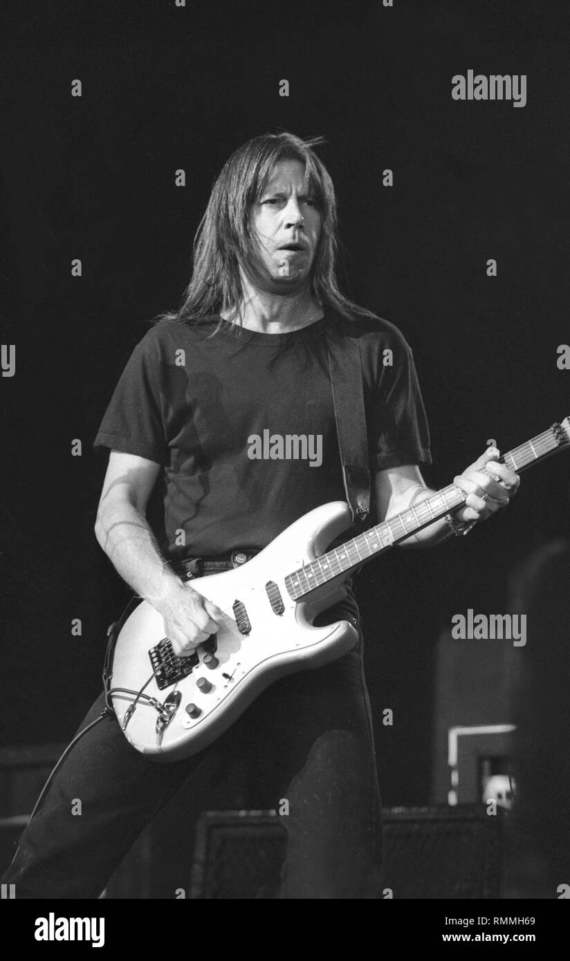 Guitarist Pat Travers is shown performing on stage during a "live ...