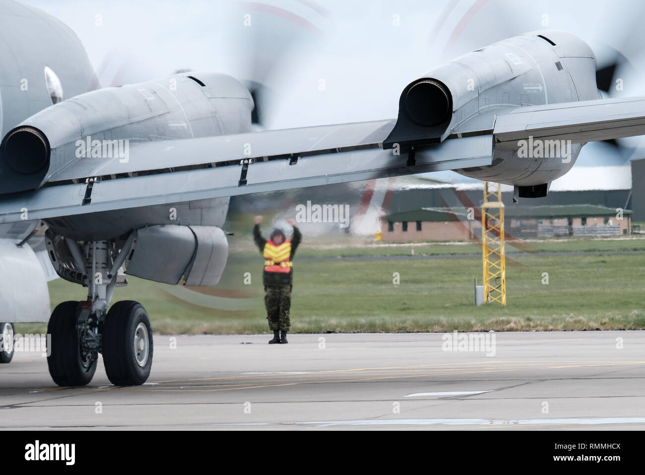 Right hand side wing and turning propellers of a Boeing P-8 Poseidon ...