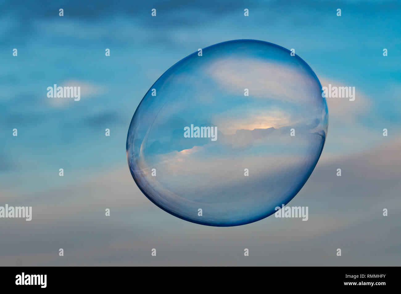 Soap bubble floating in the air Stock Photo - Alamy